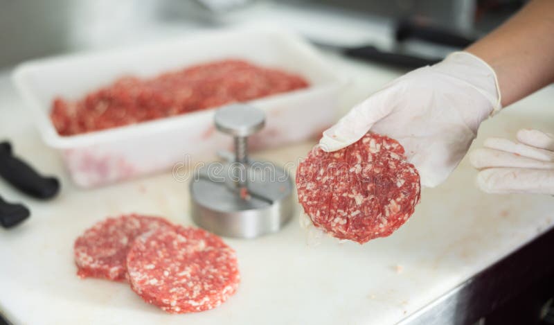 Cooking Meat Cutlets in Kitchen Using Special Devices Stock Image ...