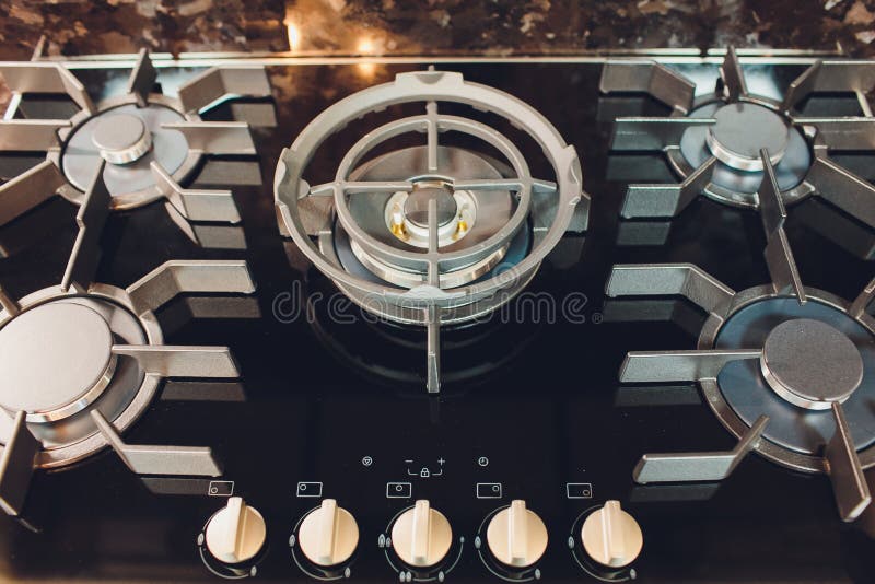 Cooking on a Modern Design Gas Stove Burner - Kitchen Tools Details ...