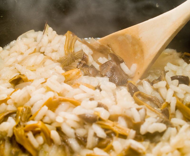 Cooking Mushroom Risotto stock image. Image of light - 11401575