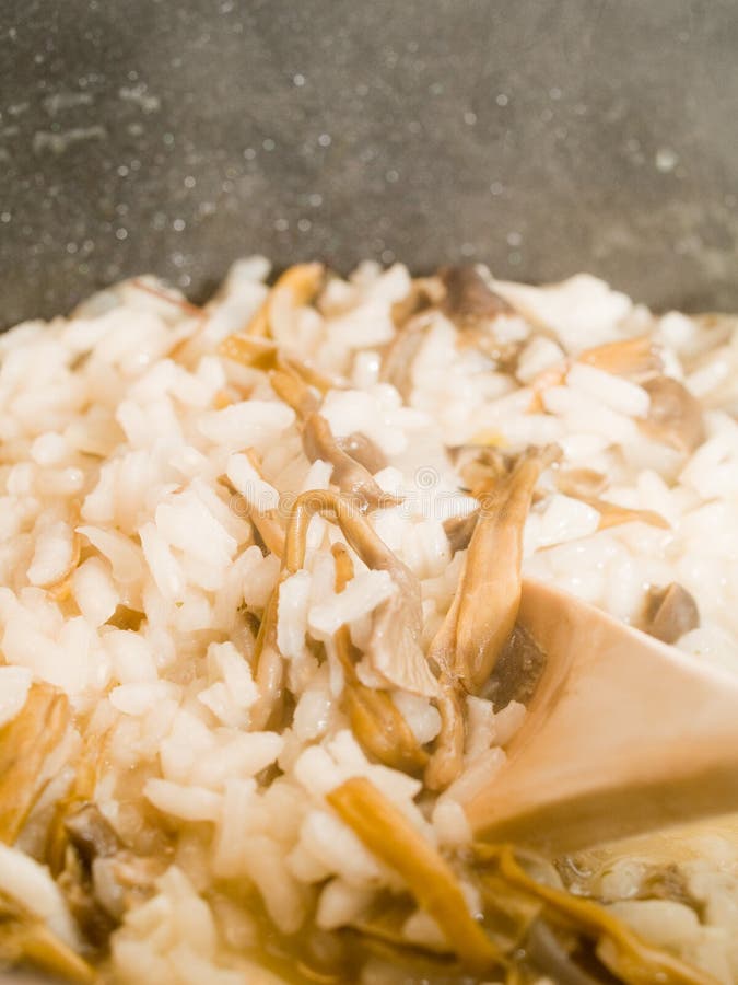 Cooking Mushroom Risotto stock photo. Image of delicious - 11401578