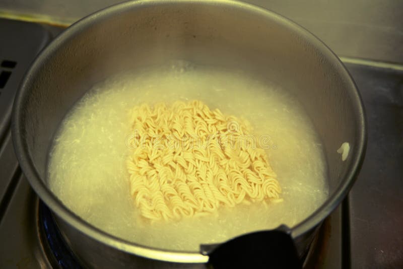 Cooking noodles stock photo. Image of cooking, asian - 204329580