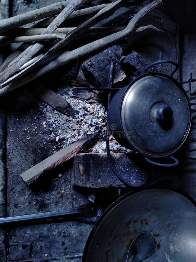 Cooking in an Old Kitchen that Still Uses Firewood Stock Image - Image ...