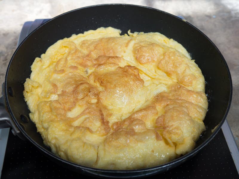Cooking omelet in pan stock photo. Image of meal, chicken - 76284750