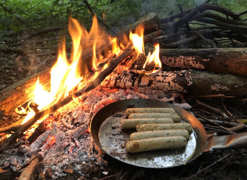 Cooking on an Open Fire during Bushcraft in the Woods Stock Photo ...