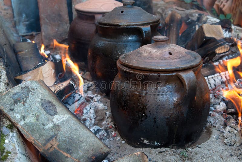 Cooking on an open fire stock photo. Image of food, camping - 34836832