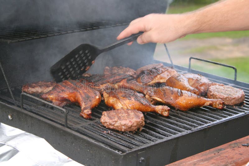 Cooking Out on the Grill! stock photo. Image of hamburgers - 12896800