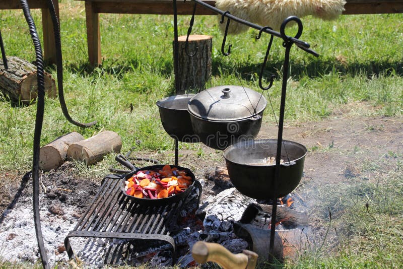 Cooking outdoors stock photo. Image of wood, cast, iron - 50765648