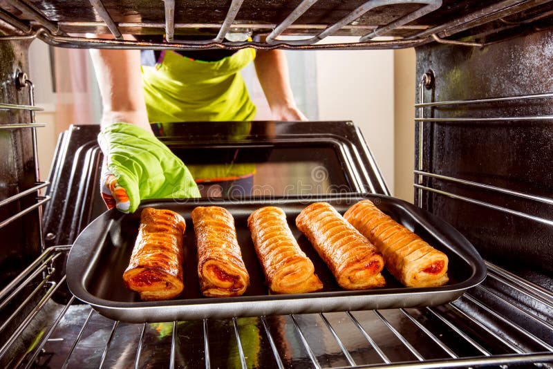 Cooking in the Oven at Home. Stock Photo - Image of cakes, broil: 54142808