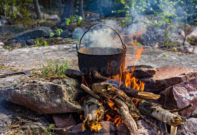 Cooking Over a Fire in Nature Stock Photo - Image of kettle, nature ...