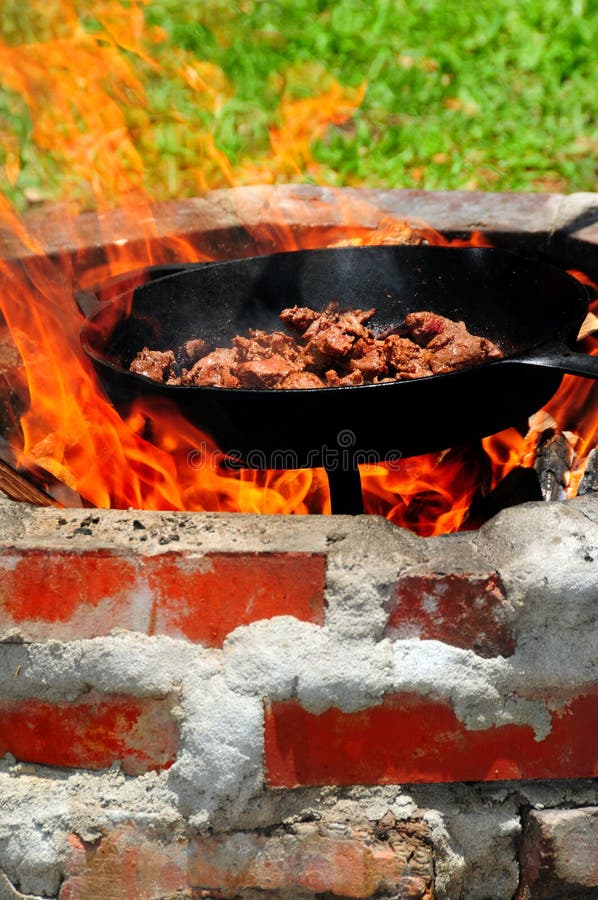 Cooking Over Open Fire stock image. Image of reenactment - 5411629