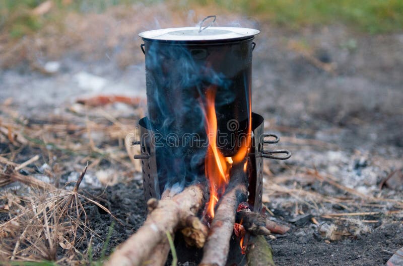 Cooking Over Open Fire at Campsite Stock Image - Image of outside ...
