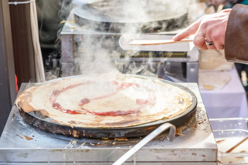 Cooking pancake outdoors stock photo. Image of dessert - 90498514