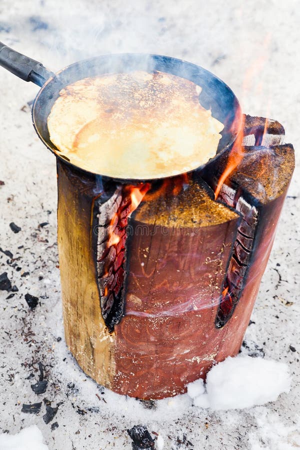 Cooking pancakes on fire stock image. Image of firewood - 87397725