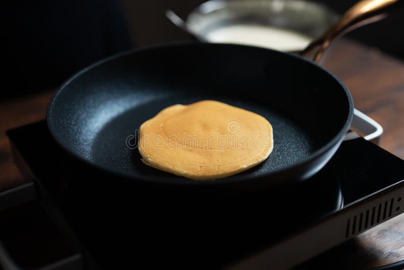 Cooking Pancakes in Pan on Stove. Stock Photo - Image of frying, meal ...