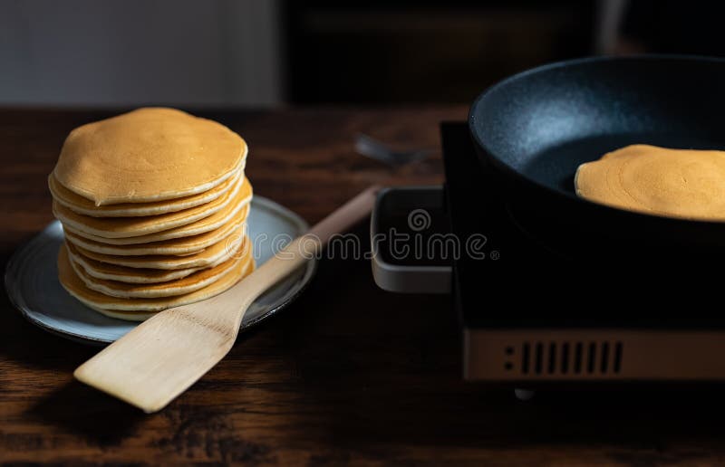 Cooking Pancakes in Pan on Stove. Stock Photo - Image of russian ...