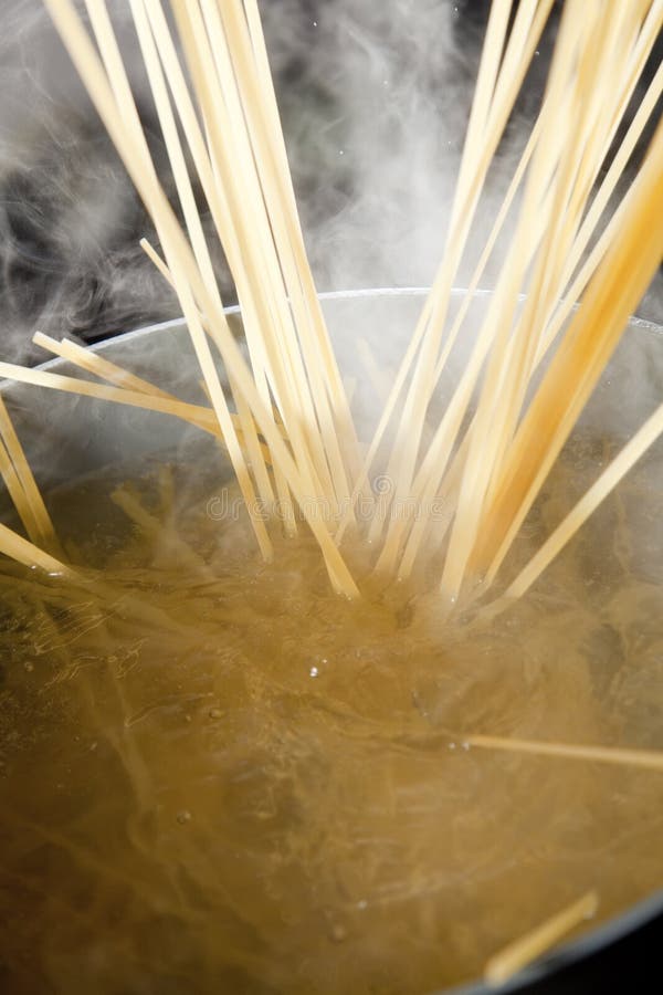 Cooking pasta stock photo. Image of water, kitchen, uncooked - 15616620