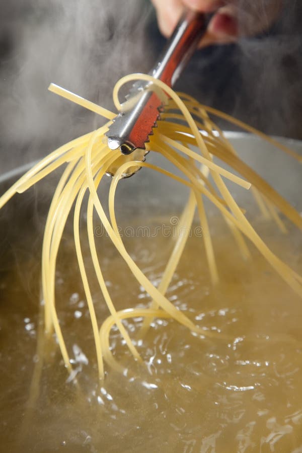 Cooking pasta. stock image. Image of people, cooking - 15616711