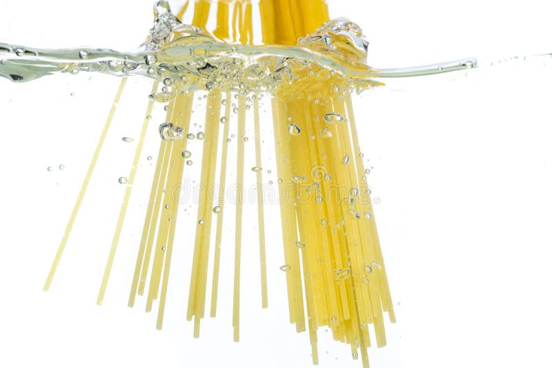 Cooking Pasta Spaghetti Falling Into Boiling Water And Splash On White ...