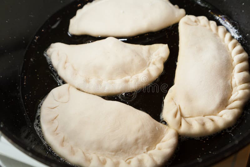 Cooking Patty on Frying Pan Stock Photo - Image of patty, cookery: 57184438
