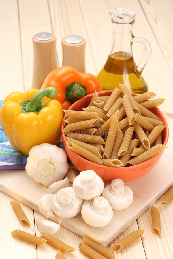 Cooking penne stock image. Image of macaroni, olive, mushroom - 5009163