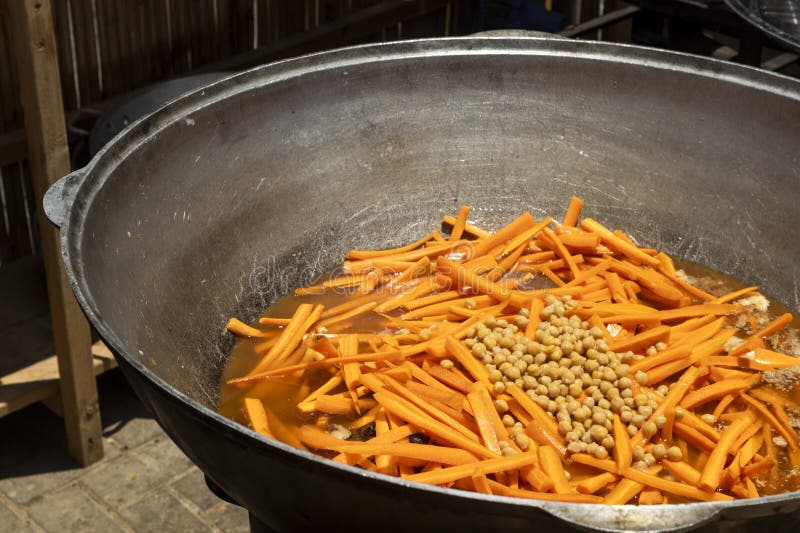 Cooking Pilaf in a Cauldron Stock Image - Image of cobblestones, large ...