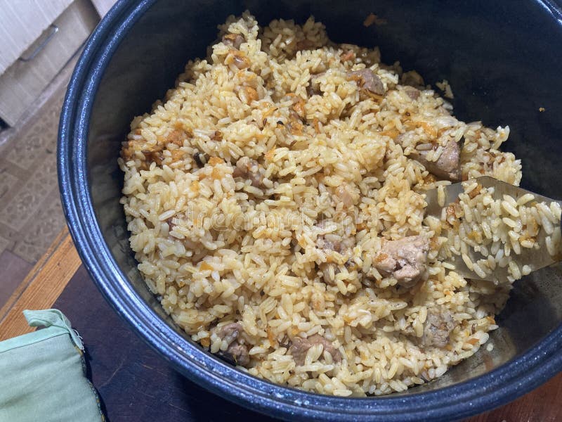 Cooking Pilaf Rice with Meat, Vegetables and Spices Stock Image - Image ...