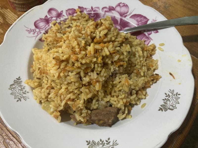 Cooking Pilaf Rice with Meat, Vegetables and Spices Stock Image - Image ...