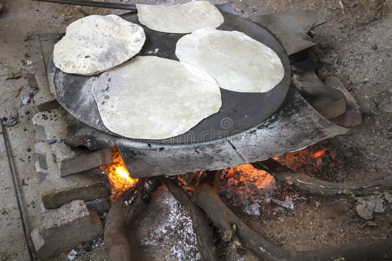 Cooking Pita Bread Over an Open Fire Stock Photo - Image of cook ...