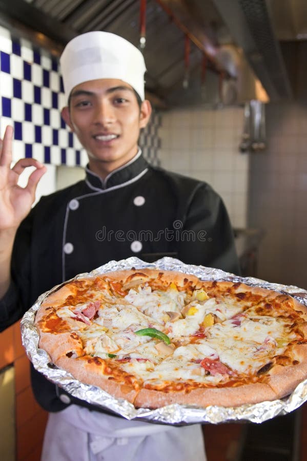 Cooking pizza stock image. Image of preparing, delicious - 6841107