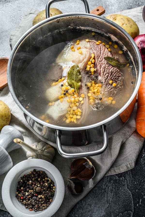 Cooking Pot with Bone Broth Meat. Vegetables Cooking Ingredients and ...