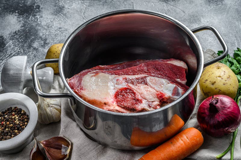 Cooking Pot with Bone Broth Meat. Vegetables Cooking Ingredients and ...