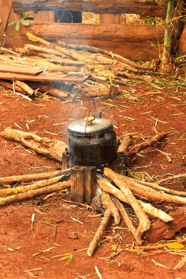 Cooking pot in campfire stock photo. Image of flame, lunch - 96411434