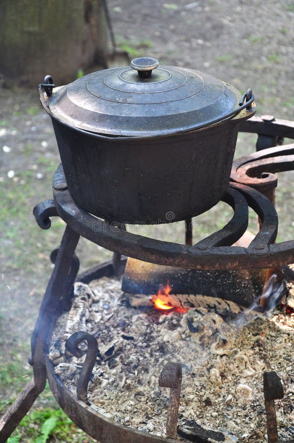 Cooking pot on fire stock image. Image of travel, ashes - 25311445