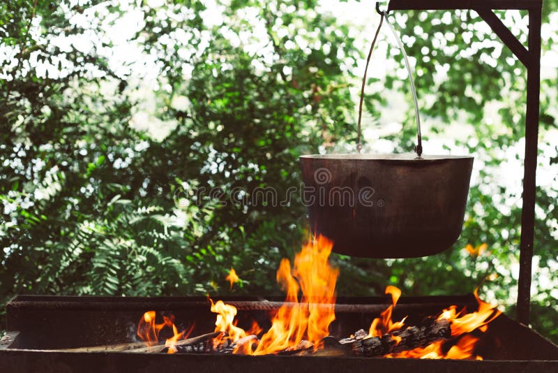 Cooking in a Pot on the Fire Stock Photo - Image of campfire, heat ...