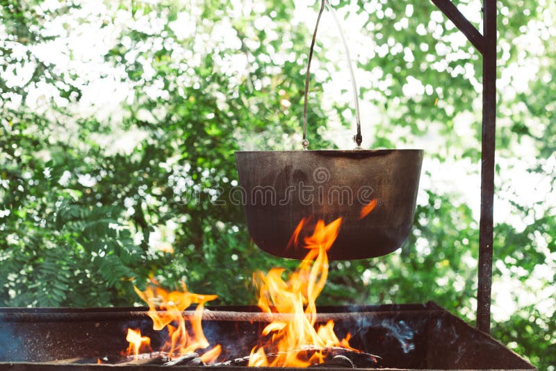 Cooking in a Pot on the Fire Stock Photo - Image of background ...
