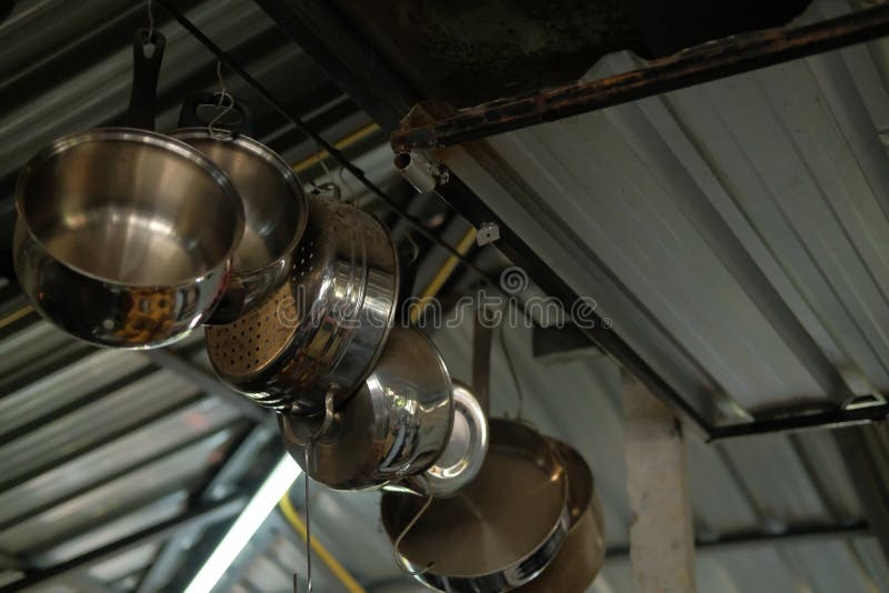 Cooking Pot Hanging on Kitchen Ceiling Stock Photo - Image of pots ...