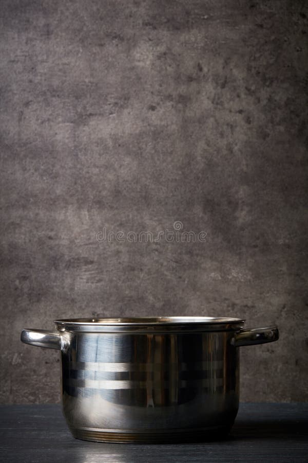 Cooking Pot on Kitchen Table Stock Photo - Image of saucepan, wood ...