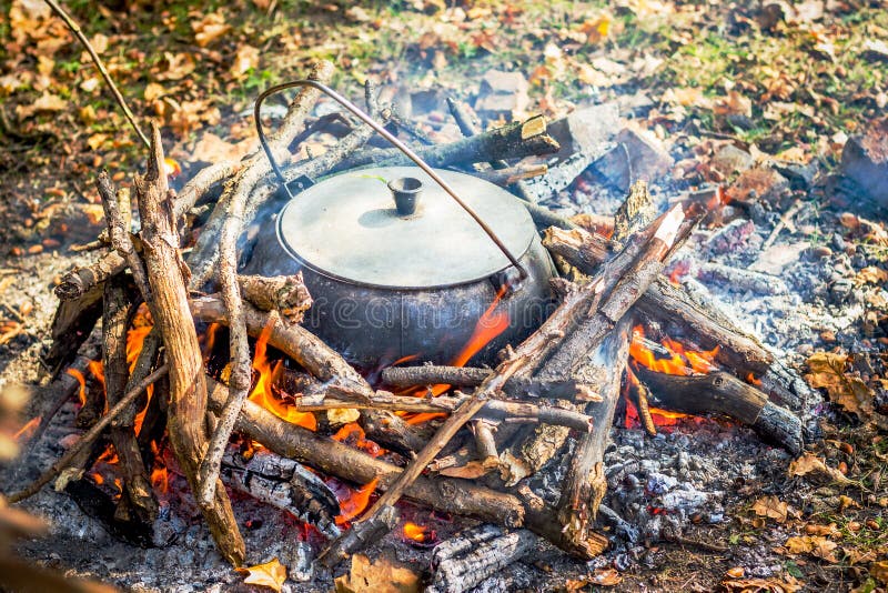 Cooking in a Pot in the Nature_ Stock Photo - Image of black, cauldron ...