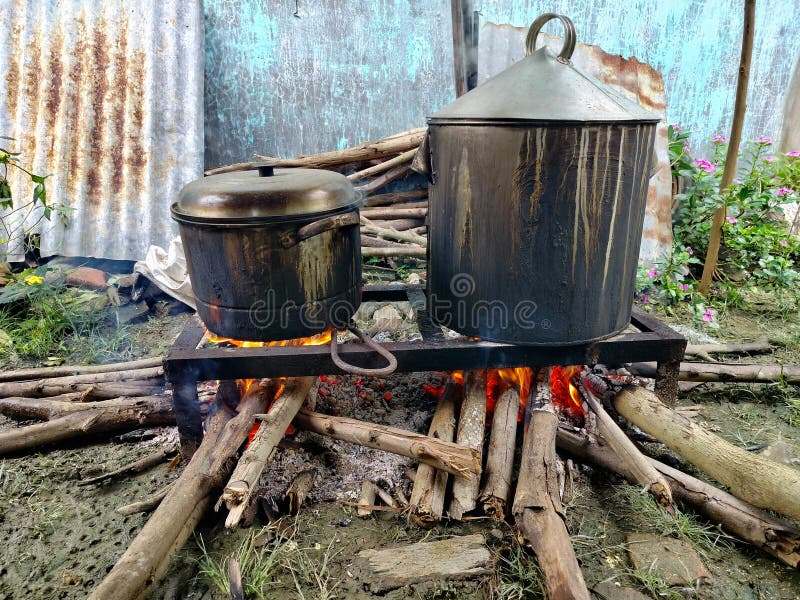 Cooking in a Pot Outside with Firewood Stock Image - Image of soil ...