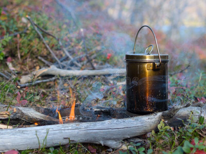 Cooking in a Pot Over the Fire. Stock Image - Image of burn, camp: 88559303