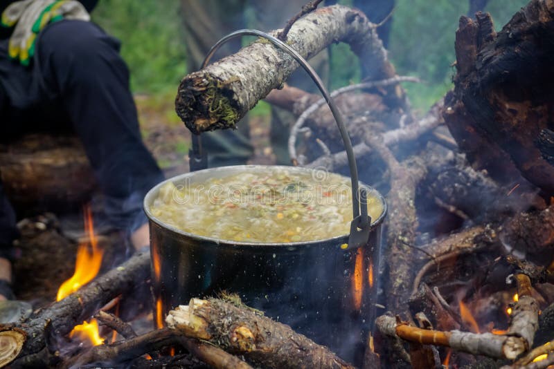 Cooking in a Pot Over a Fire in the Taiga Stock Photo - Image of rest ...