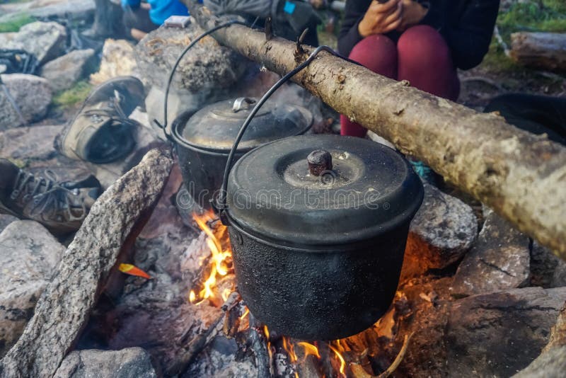 Cooking in a Pot Over a Fire in the Taiga Stock Photo - Image of forest ...