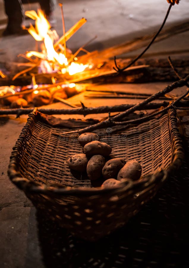 Cooking Potatoes on the Fire Stock Image - Image of light, food: 54979497