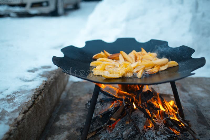 Cooking Potatoes in a Flat Pan on the Bonfire Outdoor of Winter Stock ...