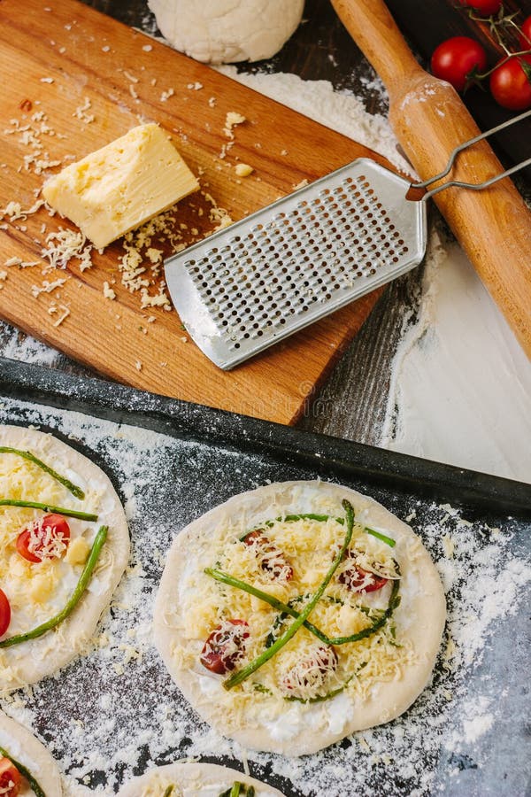 Cooking Process of Making Mini Pizza - Small and Personal, with Cheese ...