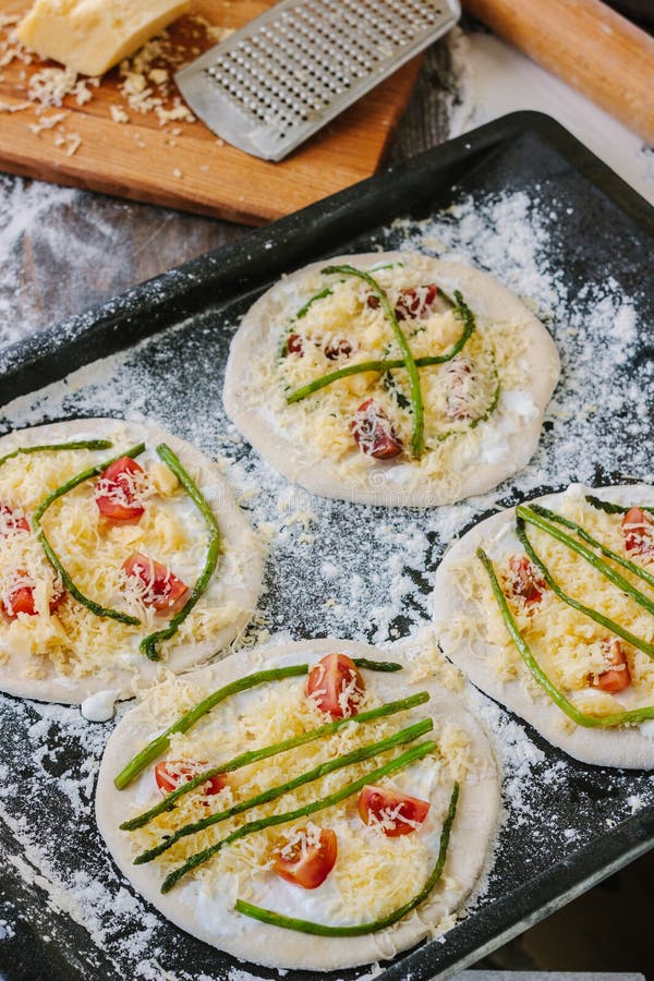 Cooking Process of Making Mini Pizza - Small and Personal, with Cheese ...