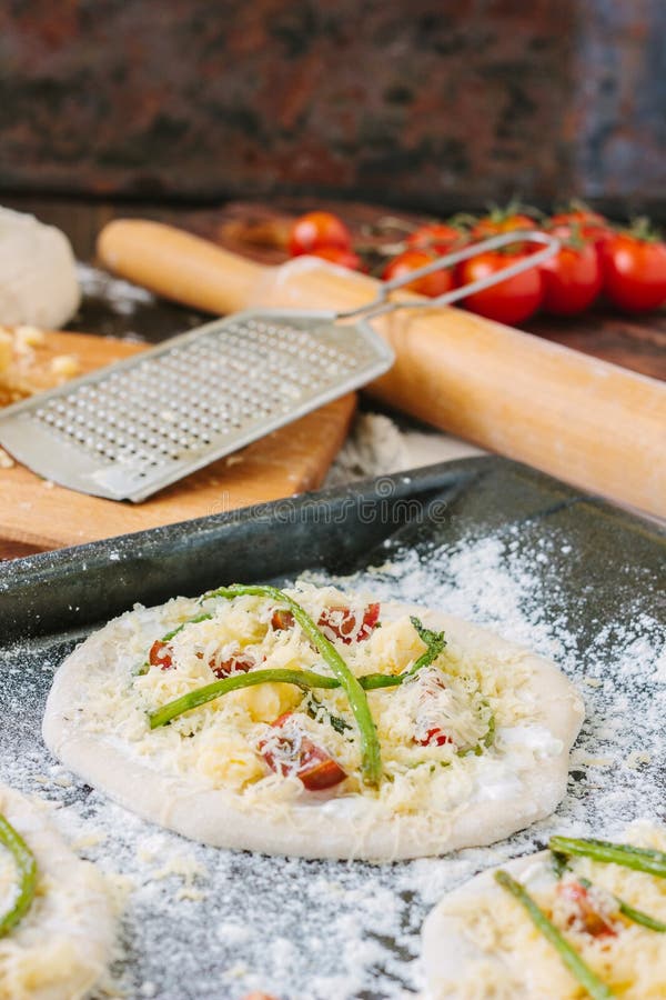 Cooking Process of Making Mini Pizza - Small and Personal, with Cheese ...