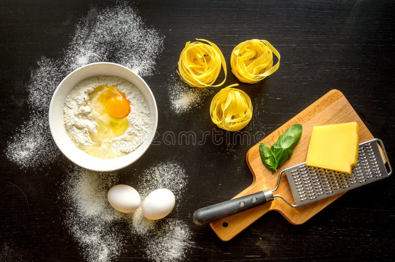 Cooking Process of Pasta on Dark Background Top View Stock Photo ...