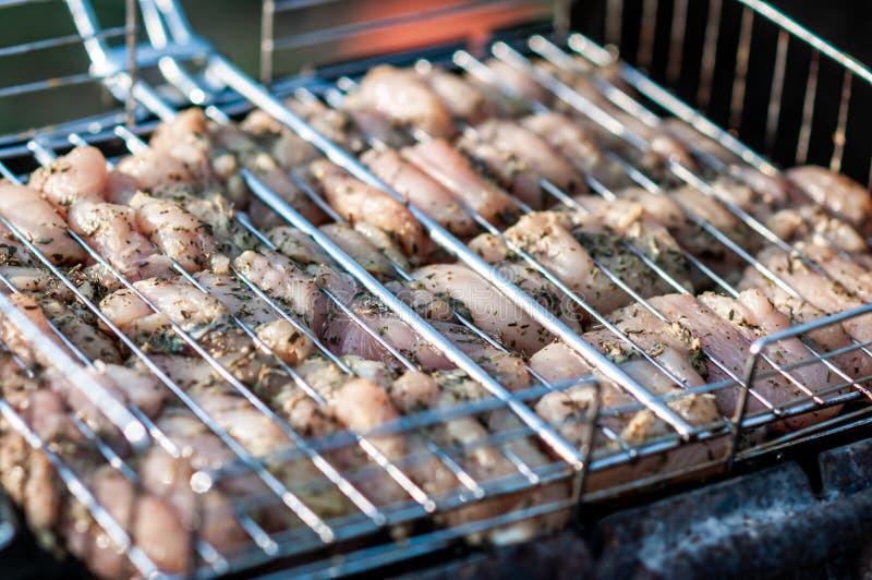 Cooking Raw Meat in a Grid on the Barbeque Grill Stock Photo - Image of ...