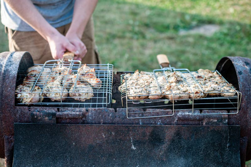 Cooking Raw Meat in a Grid on the Barbeque Grill Stock Image - Image of ...